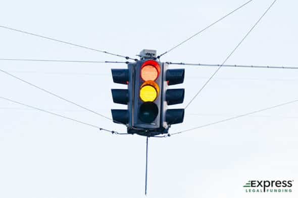 Flashing Red or Yellow Lights and Right-of-Way Accidents