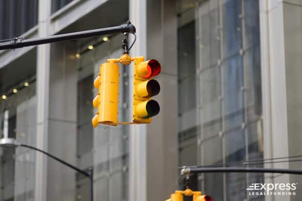 Flashing Red or Yellow Lights and Right-of-Way Accidents